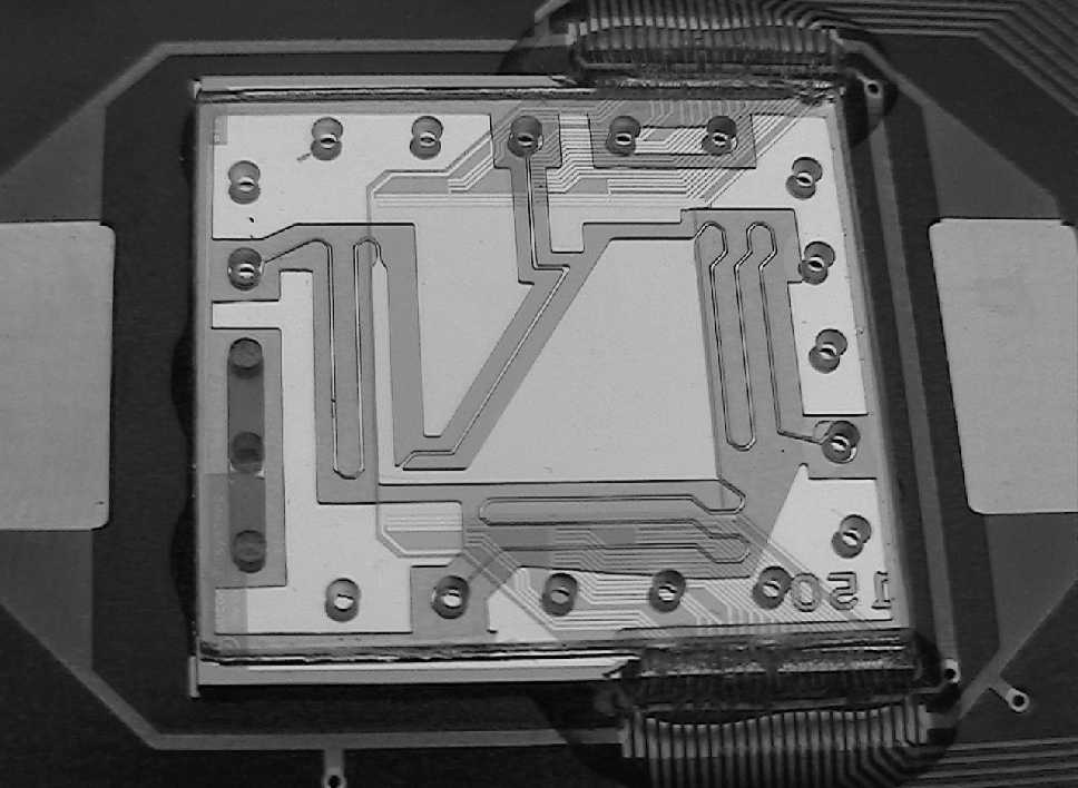 Microfluidic channel fabrication in dry film resist for production and ...